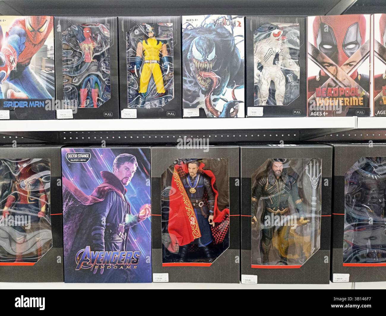 Collectible action figures display featuring marvel characters in store ...