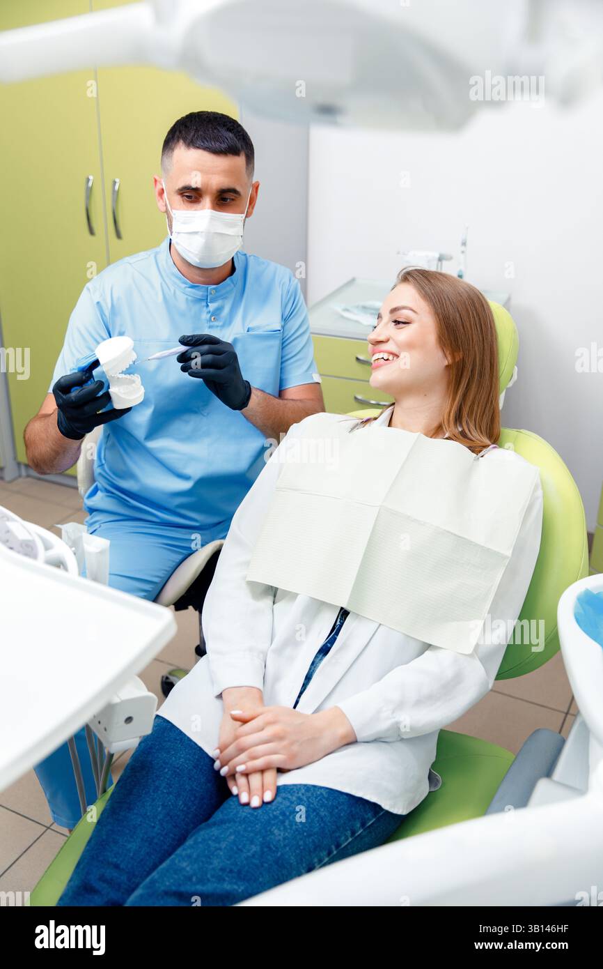 Female dentist checking little hi-res stock photography and images - Alamy