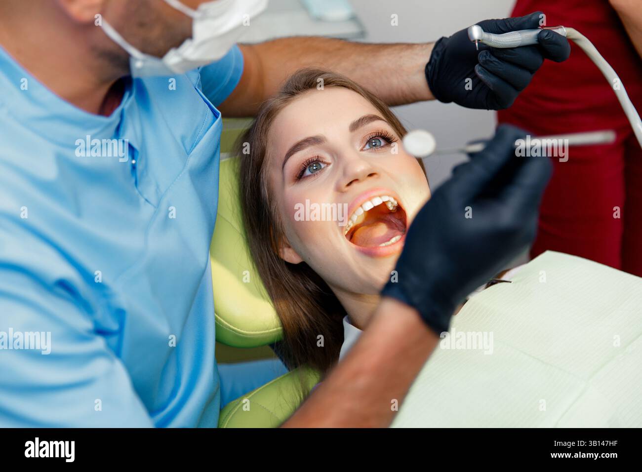 dental procedure, dentist chair, Dental treatment, Young lady lying ...
