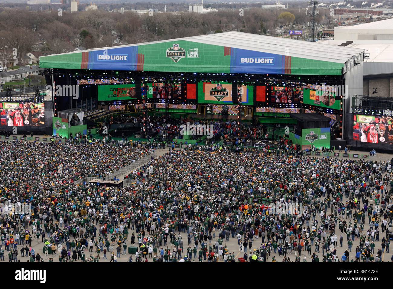 Fans crowd around the draft stage before the first round of the NFL ...