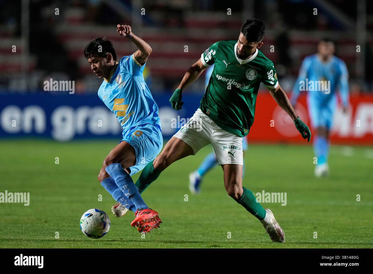 Erwin Vaca of Bolivia's Bolivar, left, is challenged by Flaco Lopez of ...