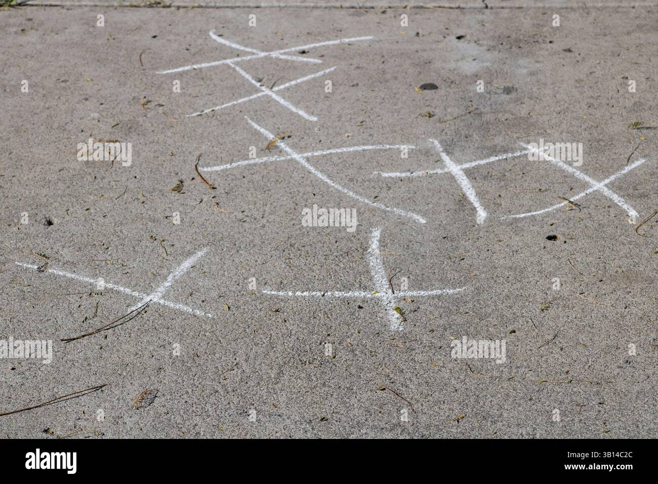 white x markings on pavement Stock Photo - Alamy