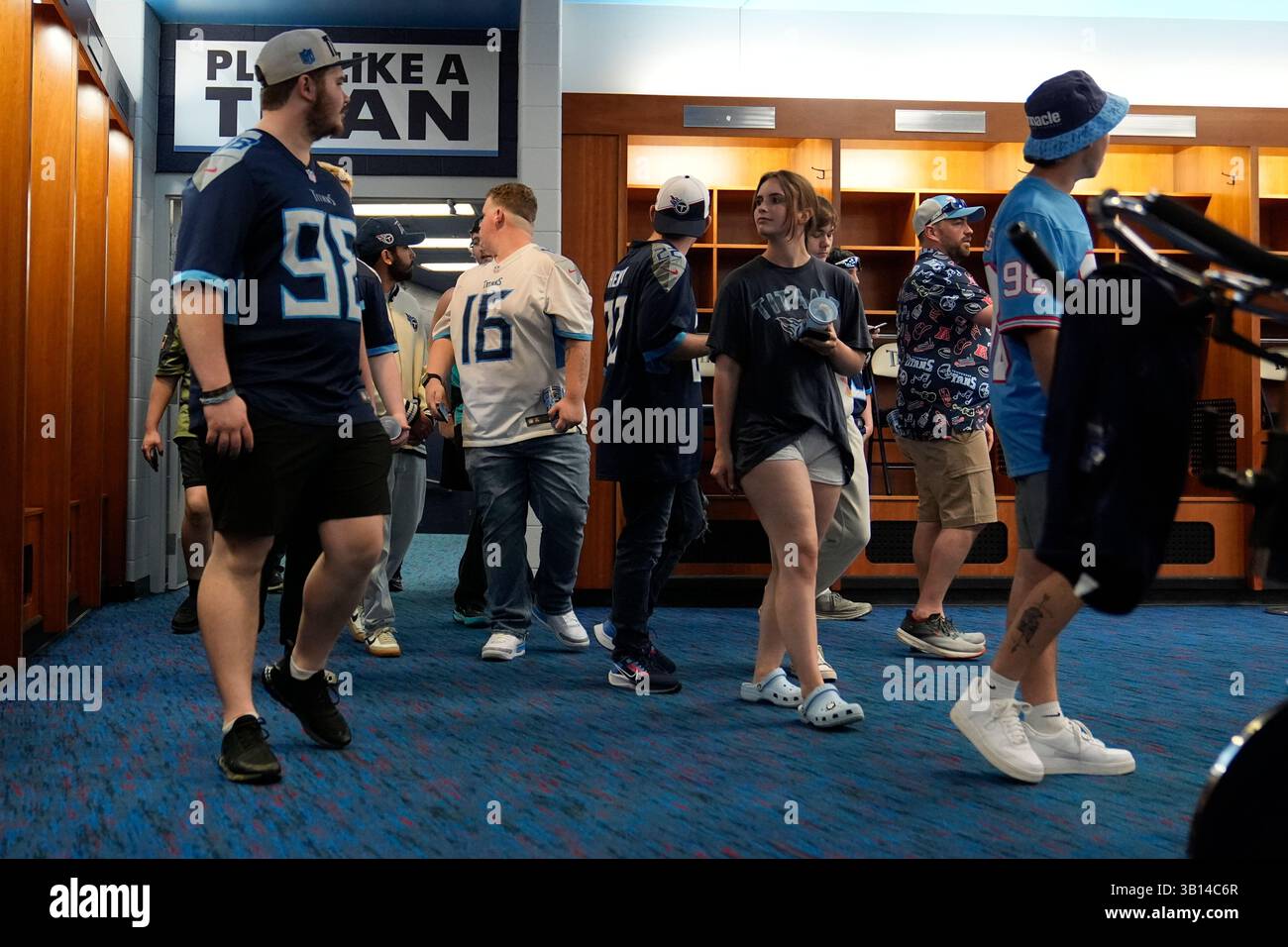 Tennessee Titans fans tour the team's locker room during an NFL ...