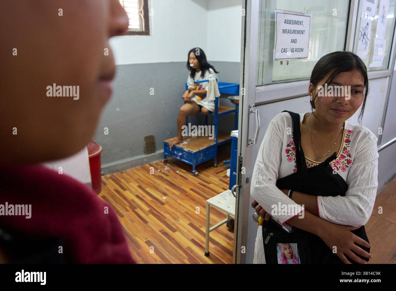 Khendo Tamang, left, and Nirmala Pariyar, right, visit a rehabilitation ...