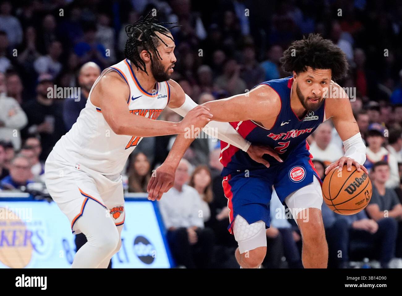 New York Knicks guard Jalen Brunson (11) guards Detroit Pistons guard ...
