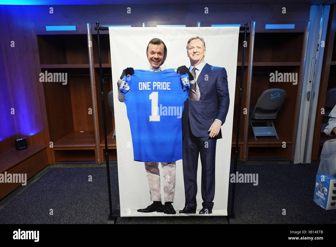 Detroit Lions fan Mike Rockafellow poses in a cutout with commissioner ...