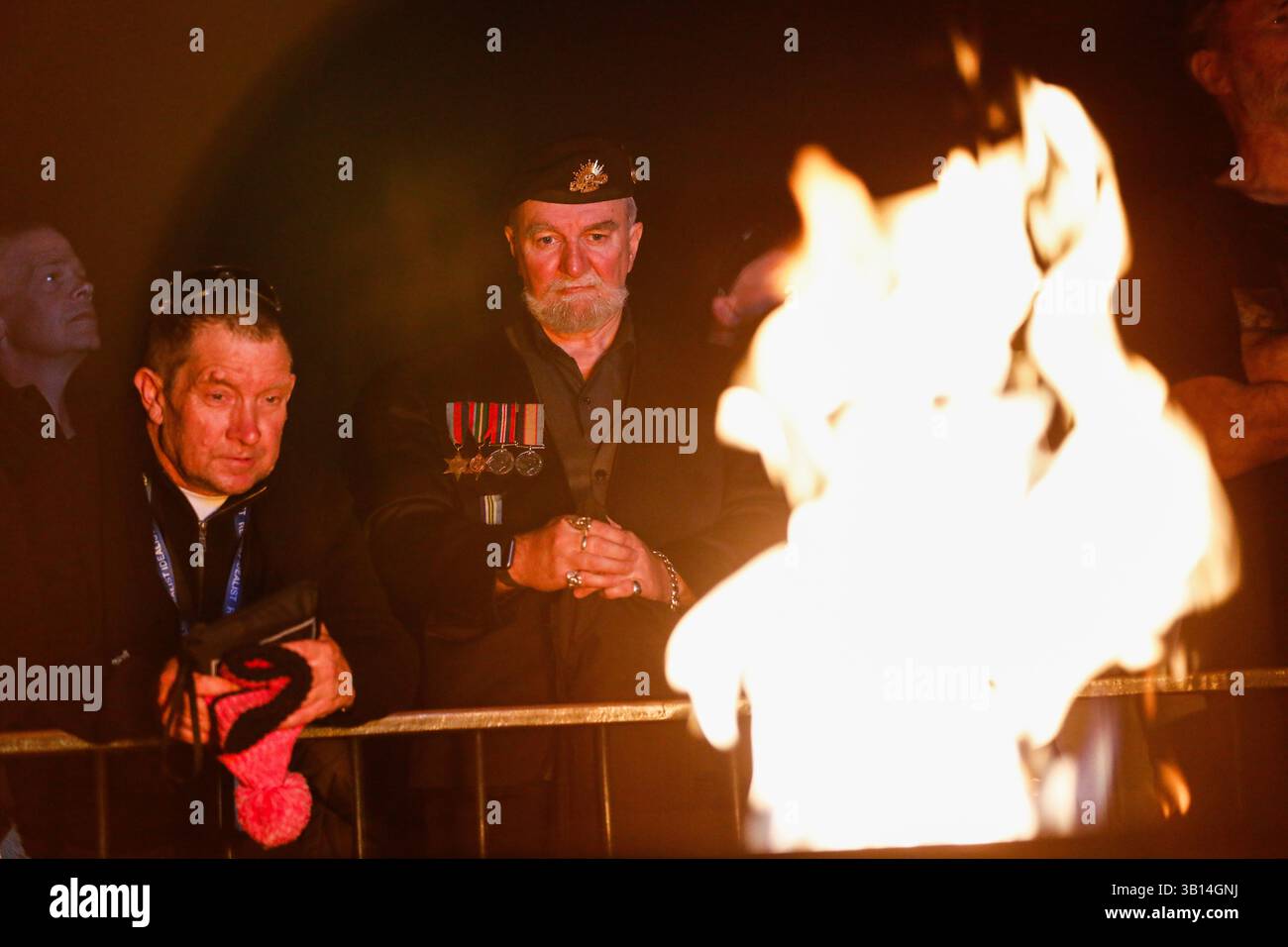 A former serviceman pays his respects during the ANZAC (Australian and ...