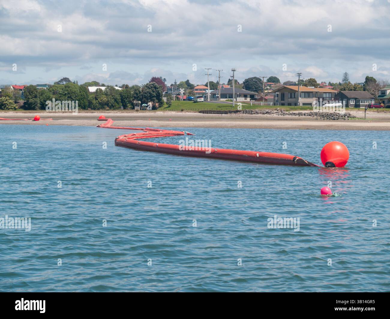 Protecting the environment from oil spills using bright red inflatable ...