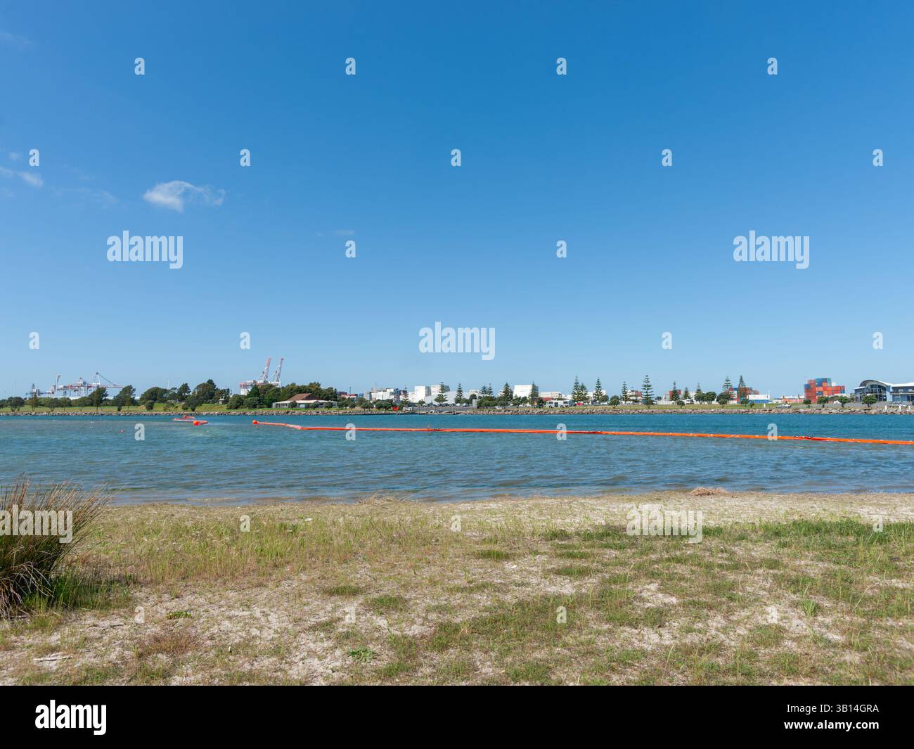 Protecting the environment from oil spills using bright red inflatable ...