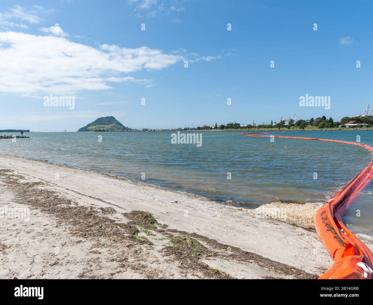 Protecting the environment from oil spills using bright red inflatable ...