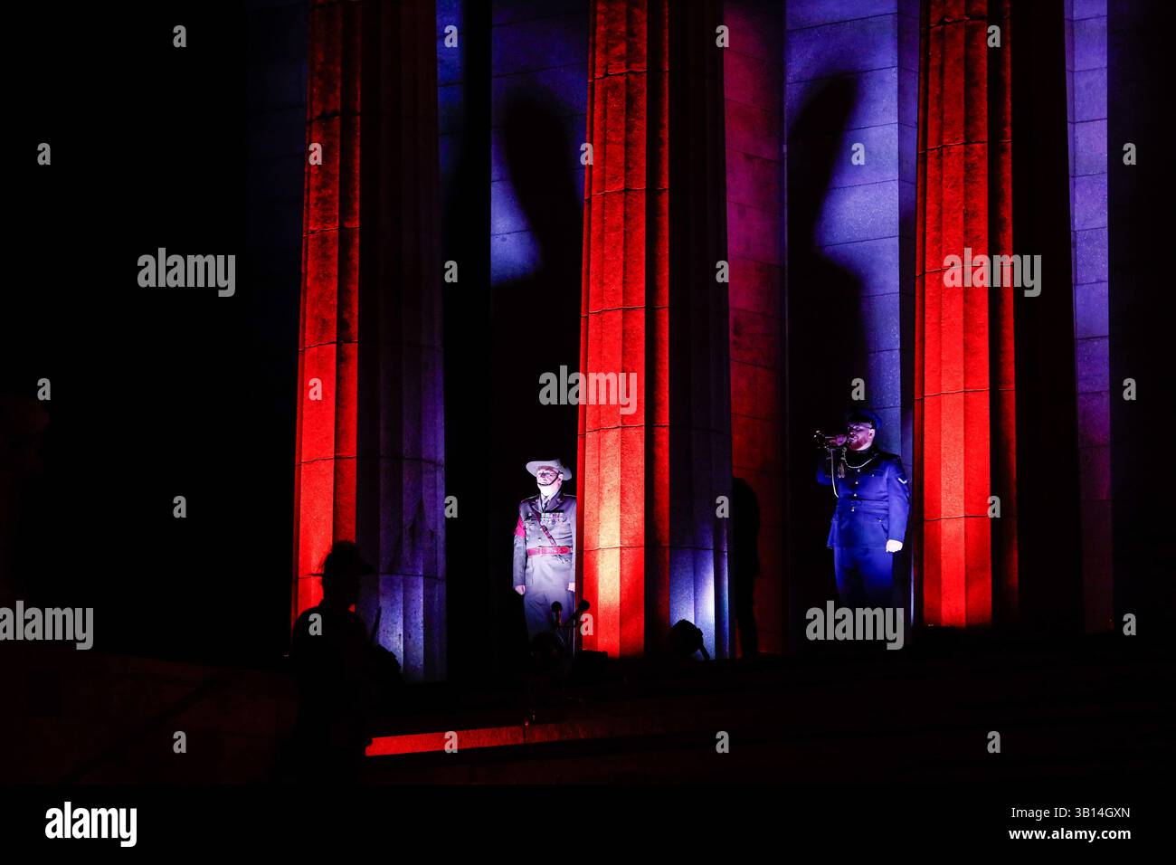 A serviceman performs a bugle call during the ANZAC (Australian and New ...