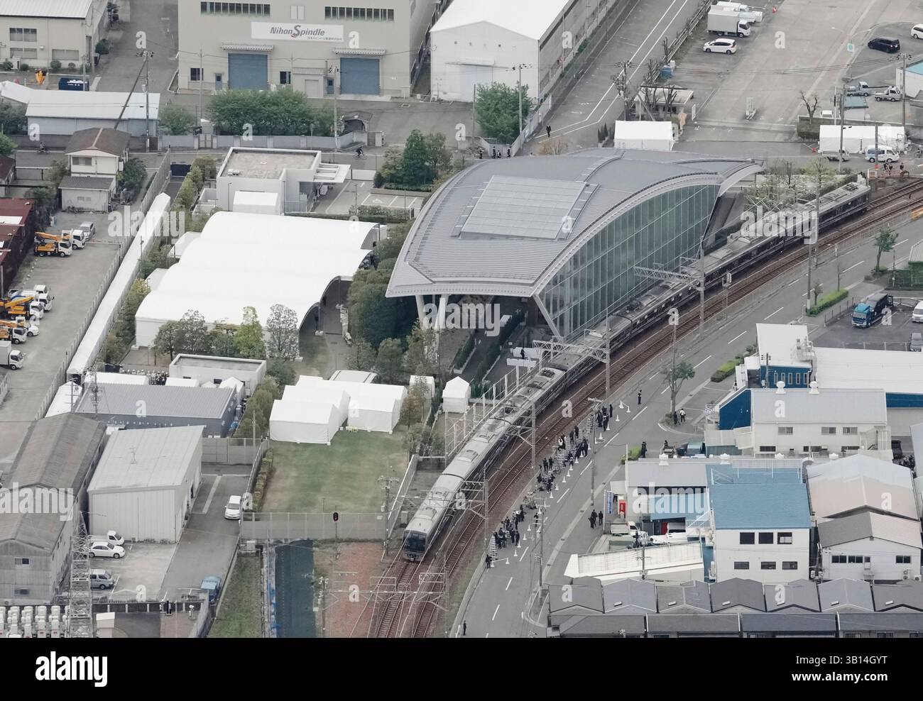 An aerial photo shows that the site of a train derailment accident 20 years ago in Amagasaki ...