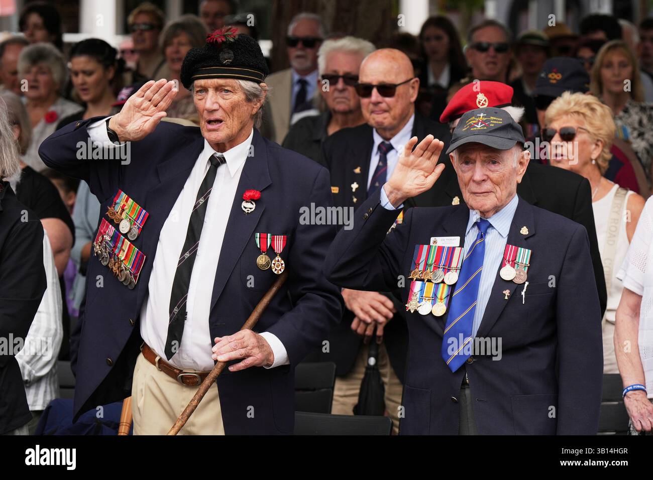 Veterans salute during the Anzac Day commemorations to honor their war ...