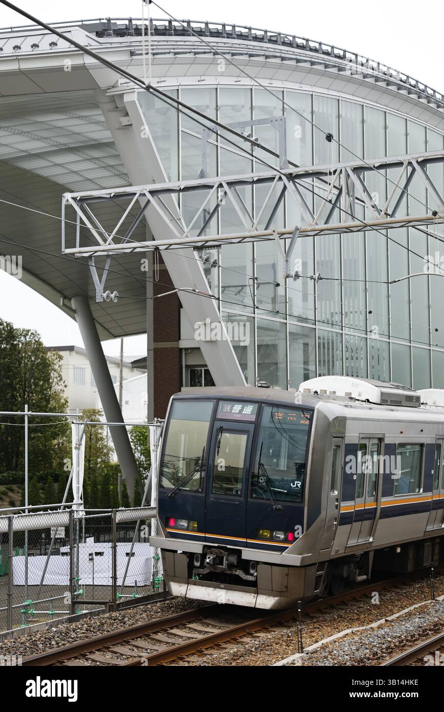 A train passes near the site of the 2005 fatal train derailment in the western Japan city of ...