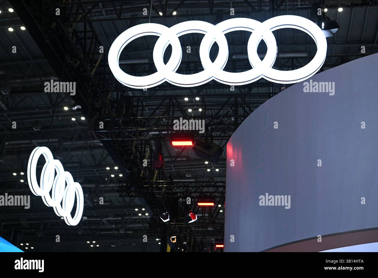 Visitors visited a model displayed at the Audi booth at the 2025 ...