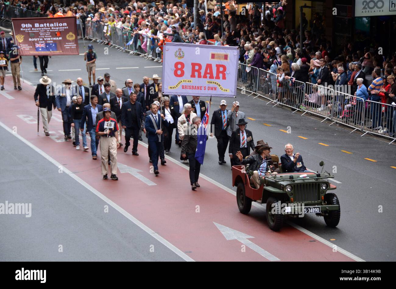 Attendees and participants are seen during an Anzac Day parade in ...