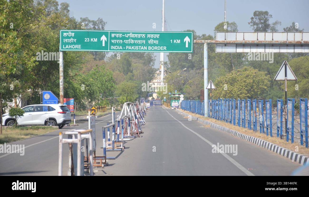 AMRITSAR, INDIA - APRIL 24: Border Security Force personnel stand guard ...