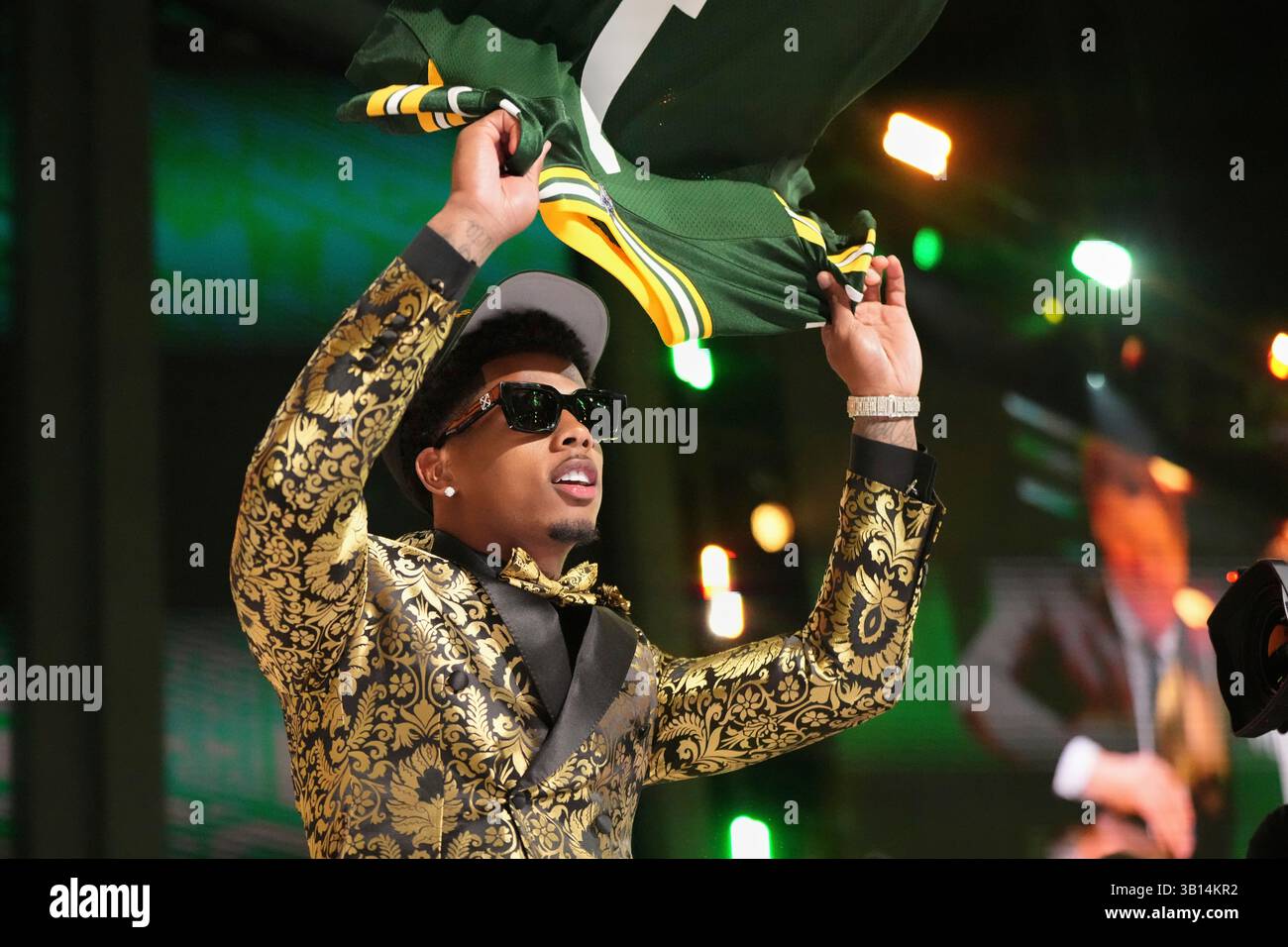 Texas wide receiver Matthew Golden celebrates after being chosen by the ...
