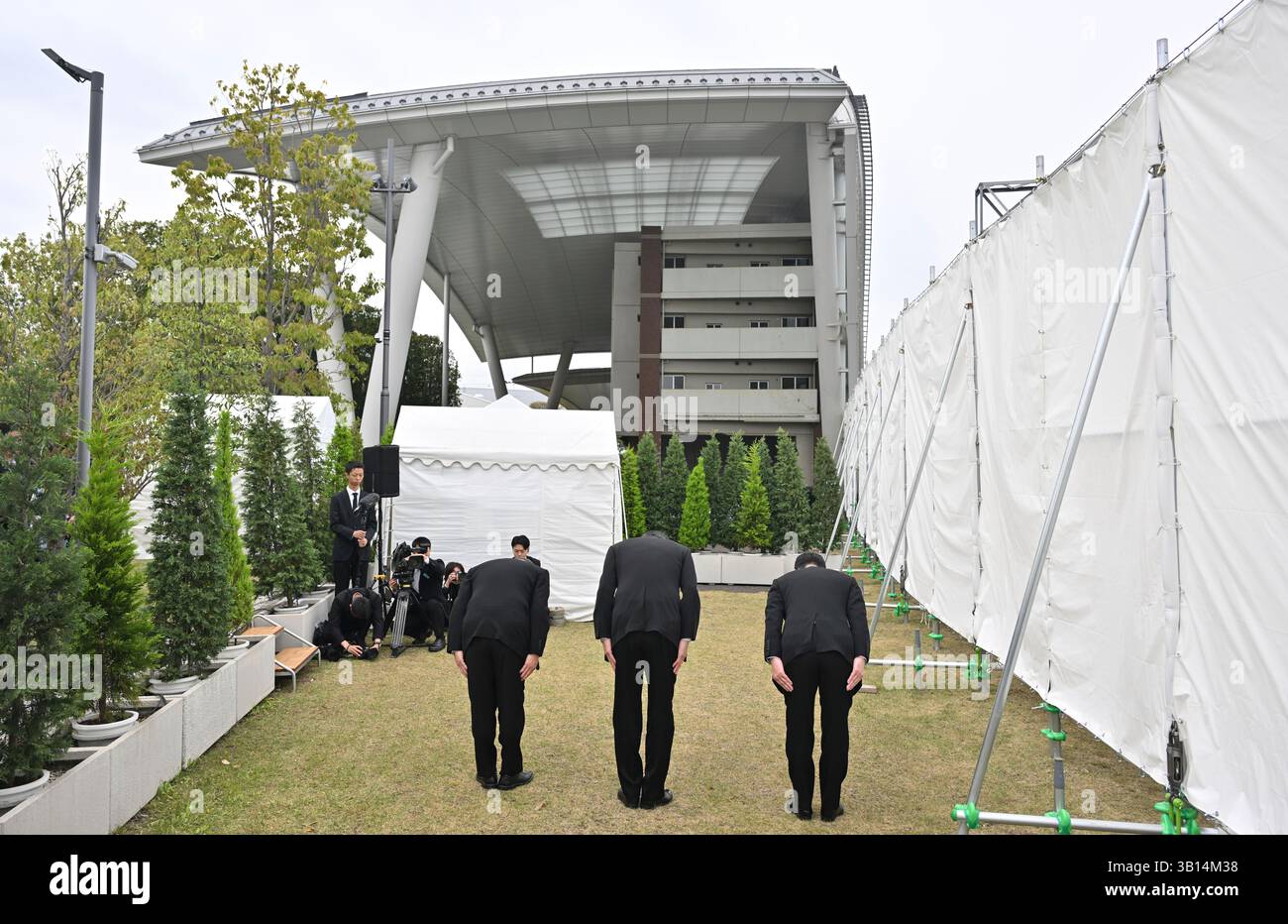 On April 25, 2025, Kazuaki HASEGAWA, President of the Japan Railways West (C), prays for the ...