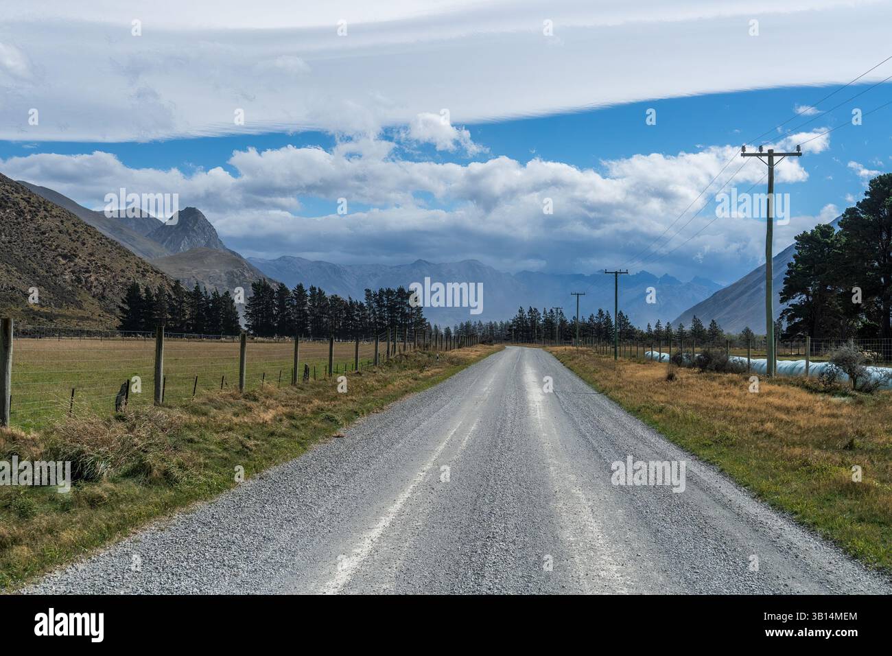 Surrounded by mountain ranges the extreme arid dry farming fields in ...