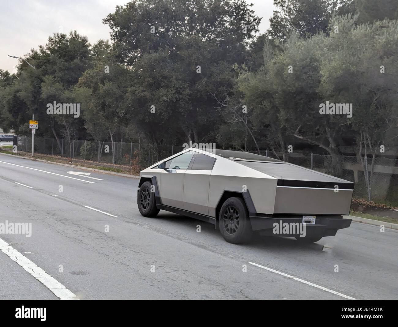 Tesla Cybertruck driving in Palo Alto, California Stock Photo - Alamy