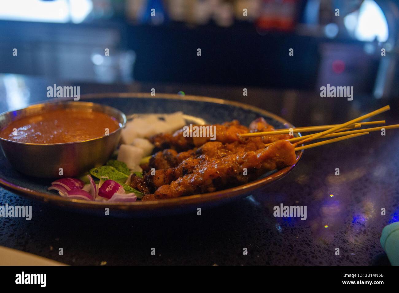 Malaysian Style Chicken satay with the condiments Stock Photo - Alamy