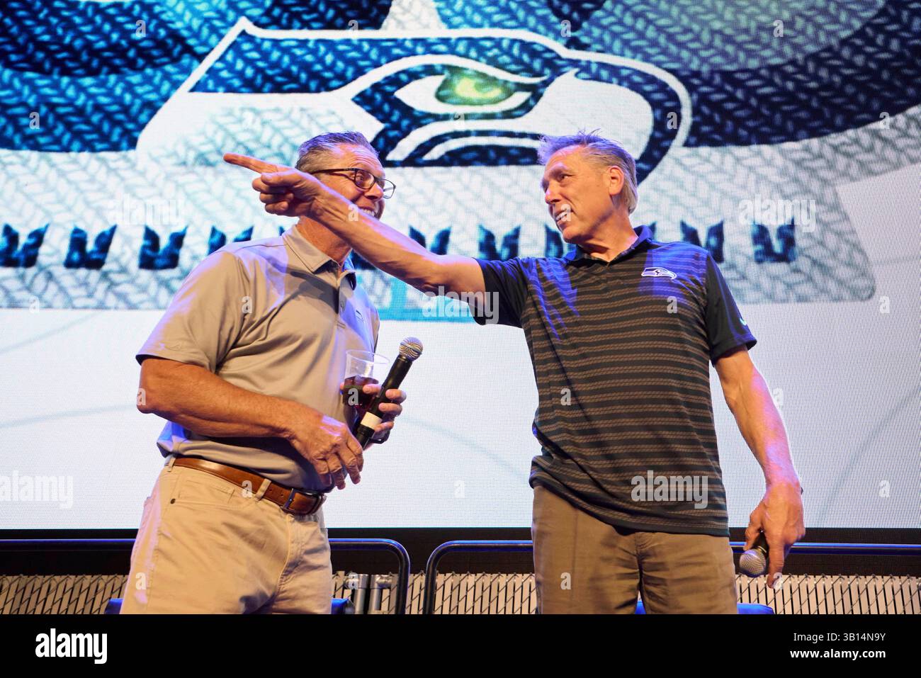 Former Seattle Seahawks' Steve Largent, left, and Jim Zorn, right, take ...