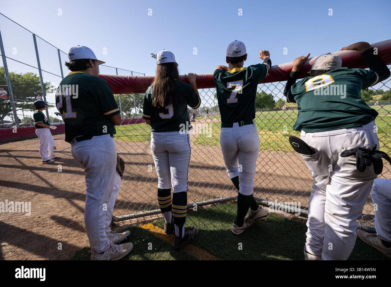 Antelope, Ca, USA. 21st Apr, 2025. Kennedy Cougars Laney Fukuoka, second from left, watching ...