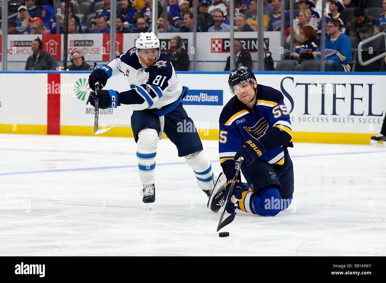 St. Louis Blues' Colton Parayko (55) reaches for the puck while under ...