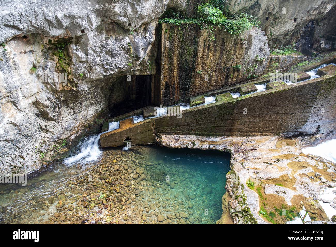 Mountain dam in the Cares gorges in Spain, with its rocky cliffs and ...