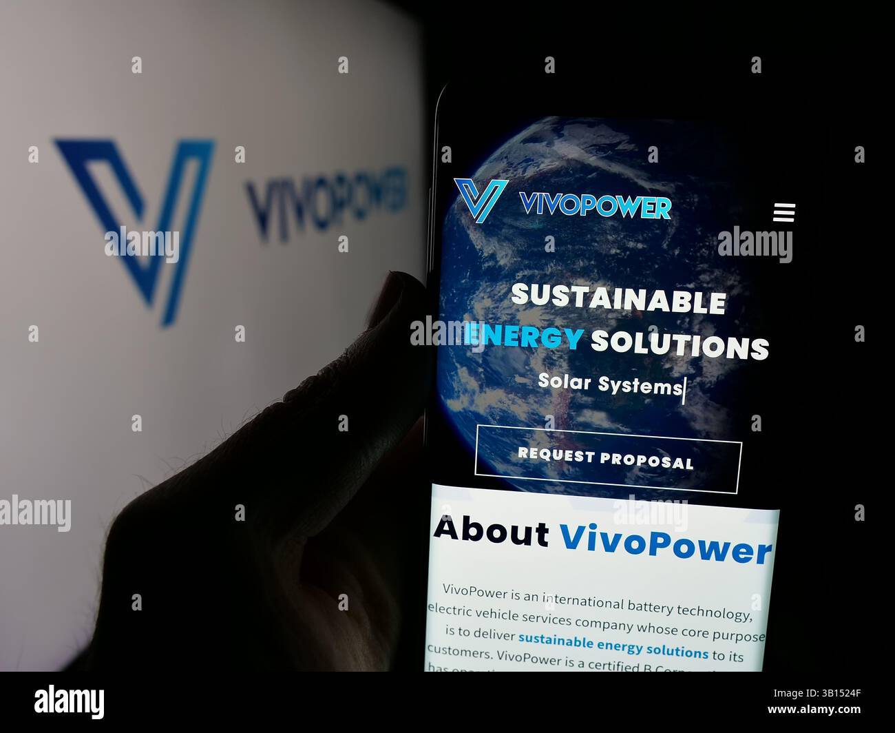 In this photo illustration, a person is holding a cellphone with the ...