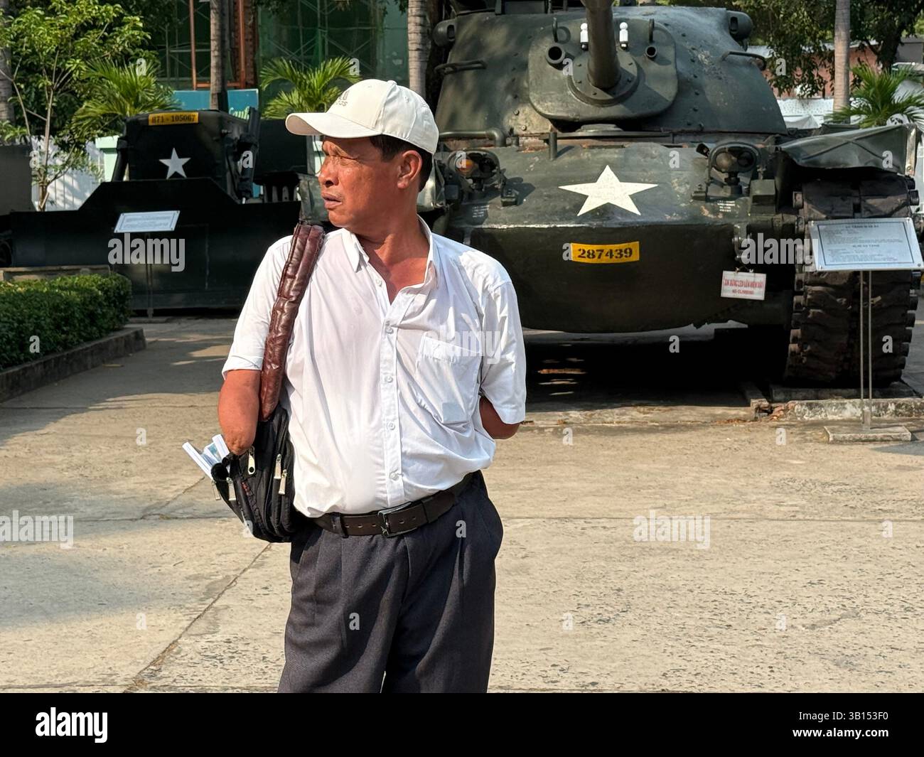 Ho Chi Minh Stadt, Vietnam. 13th Apr, 2025. 56-year-old Hui stands in ...