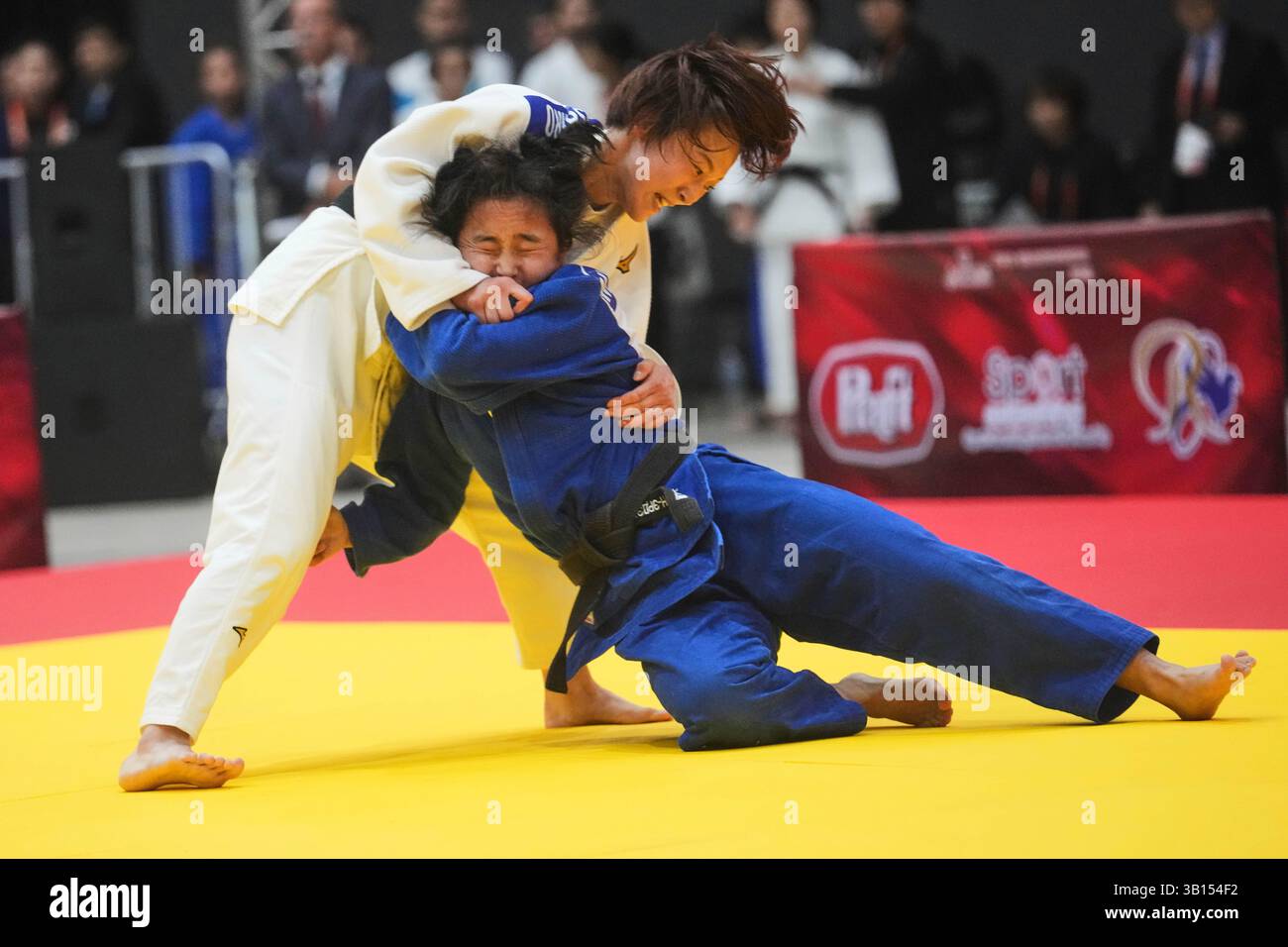 Japan's Kokoro Fujishiro, white, and Mongolia's Nandin-Erdene ...