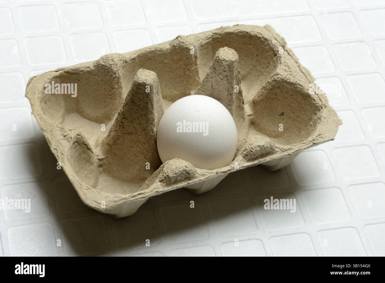 An egg in packaging, hen's egg, egg shortage Stock Photo - Alamy