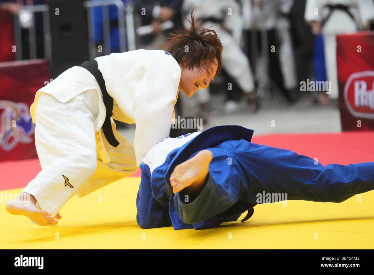 Japan's Kokoro Fujishiro, white, and Mongolia's Nandin-Erdene ...