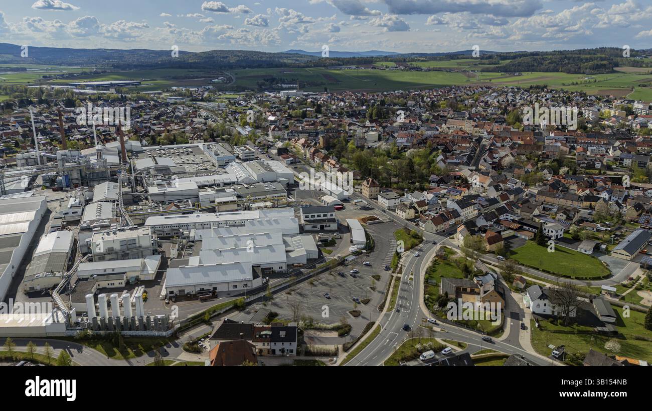 Urban landscape with large industrial area and surrounding architecture ...