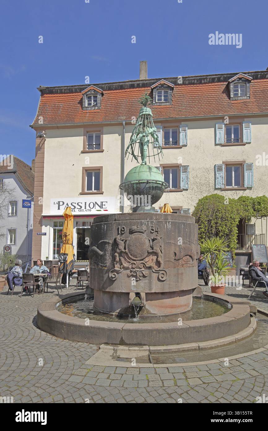 Quak fountain built in 1934 with relief and sculpture, street pub, ice ...