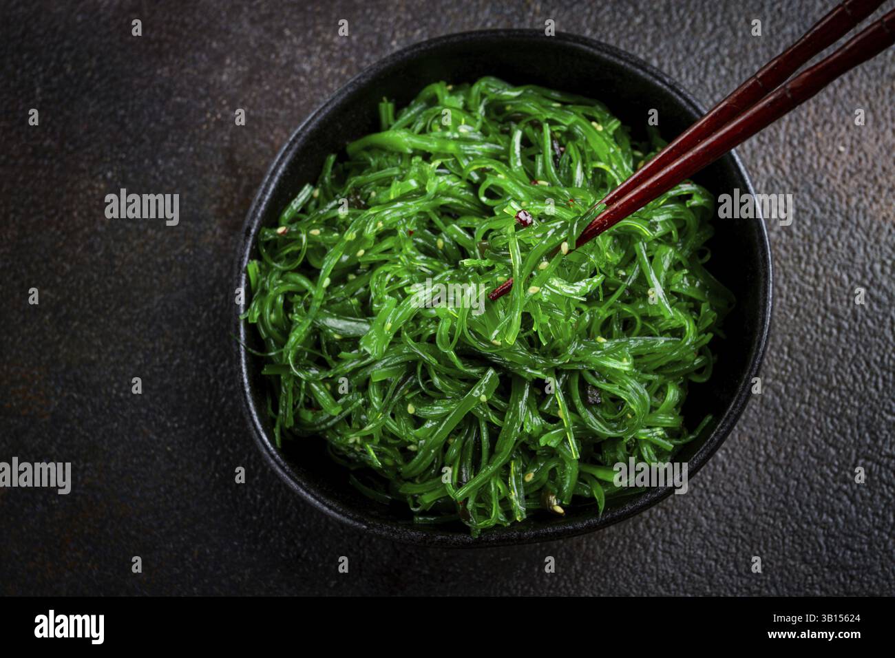 Chuka salad, made from fresh seaweed, with sesame dressing, served in a ...