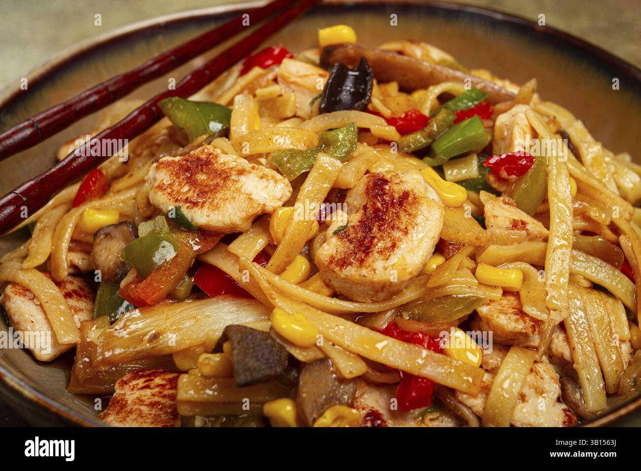 Fried noodles with chicken meat and vegetables, Bami Goreng, Indonesian ...