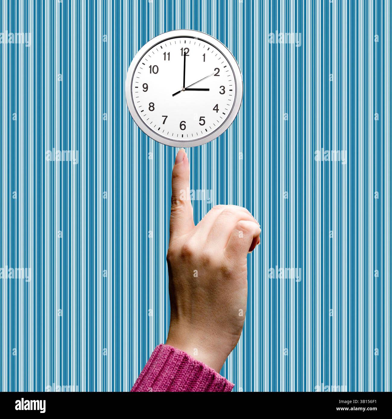 woman hand with finger pointing to a clock at 3 o'clock hour Stock ...