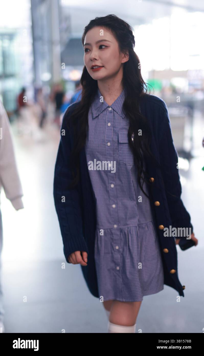 Chinese actress and singer Chen Zhuoxuan appears at the airport in ...