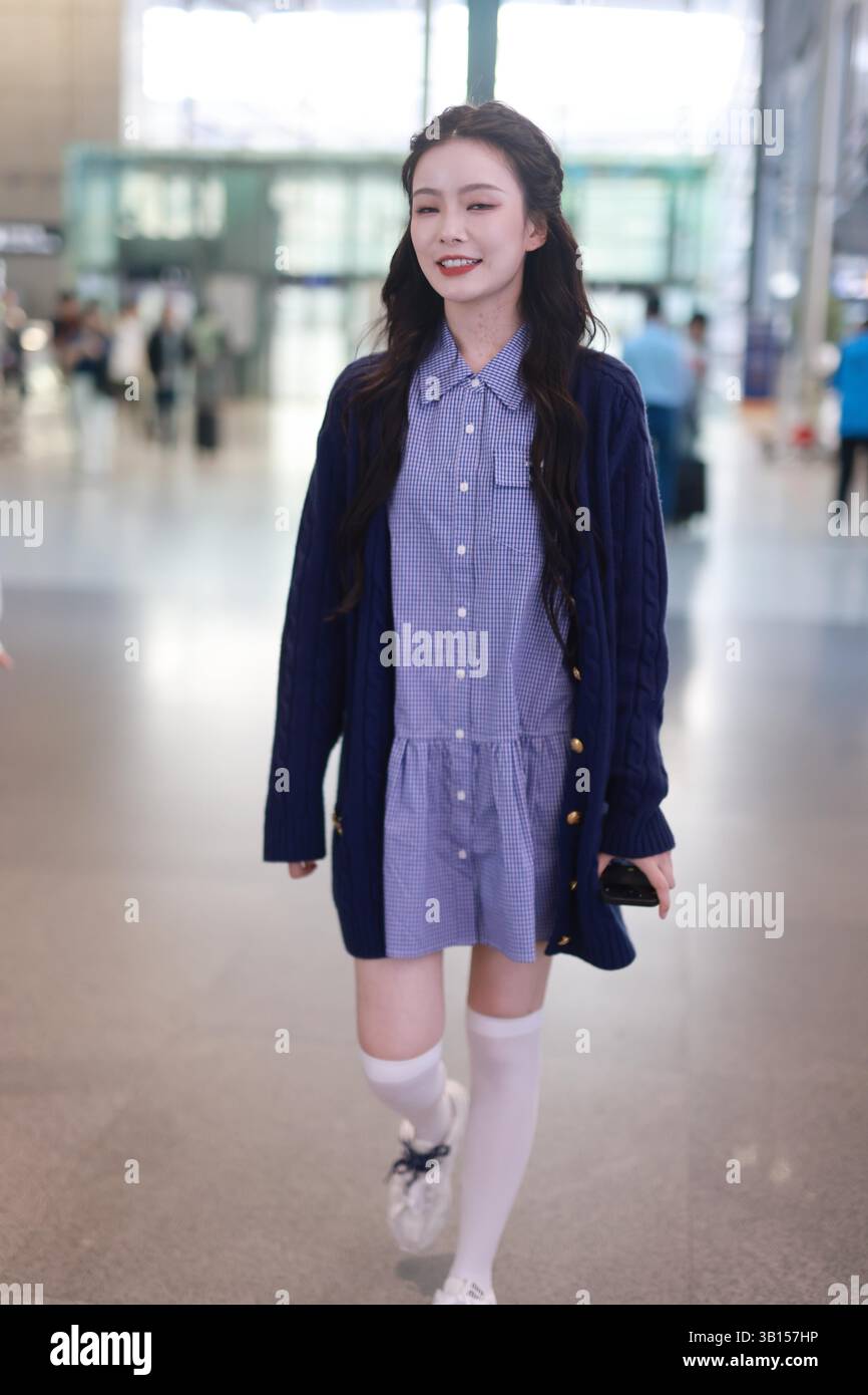 Chinese actress and singer Chen Zhuoxuan appears at the airport in ...