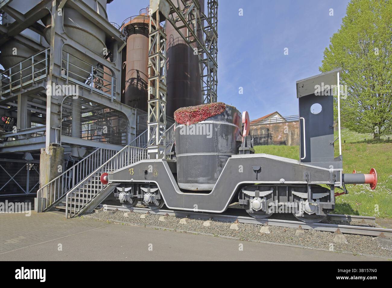 Blast furnace with blower house and railway wagon with casting ladle ...