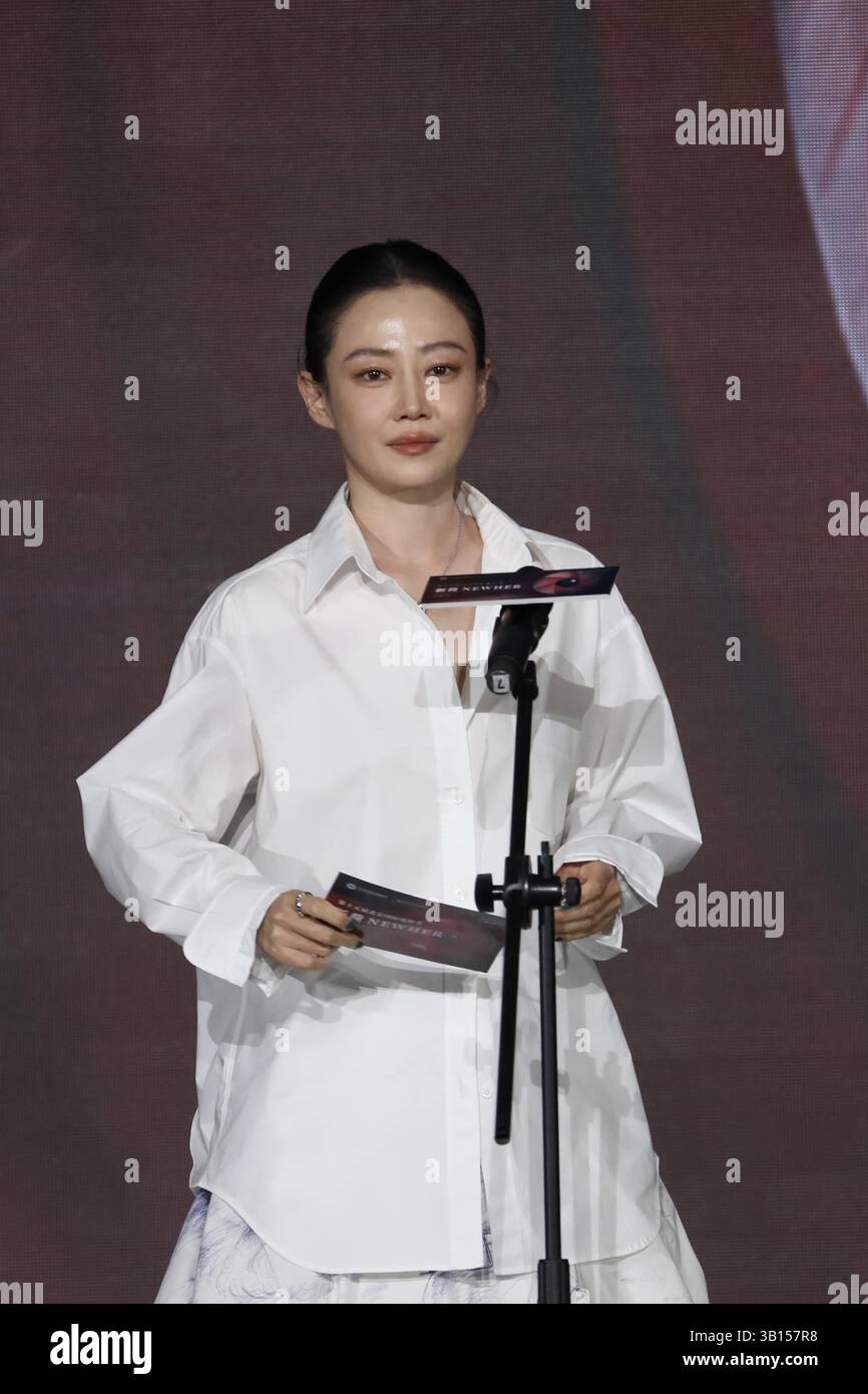 Chinese television and film actress Tan Zhuo attends an activity in ...