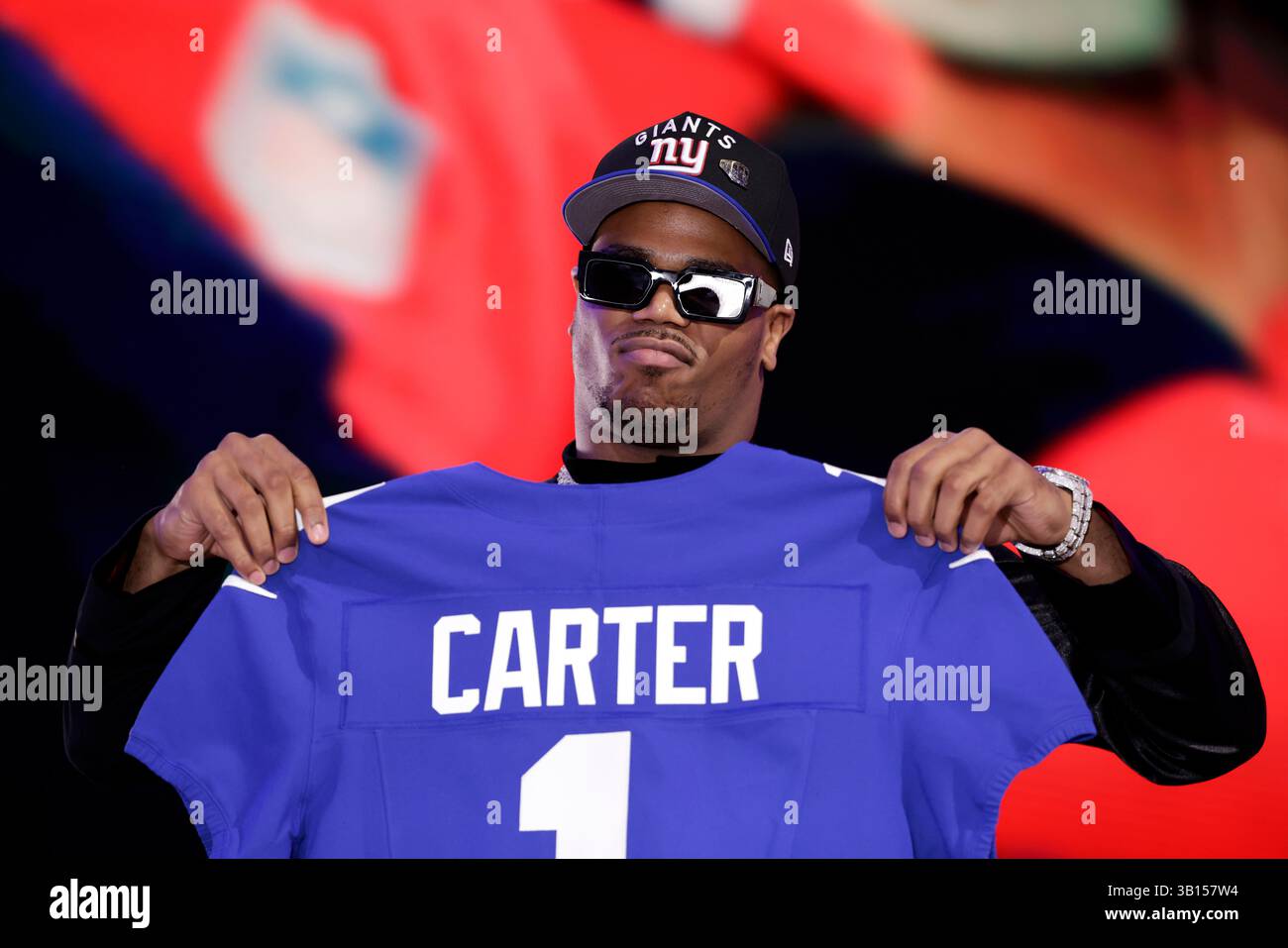 Penn State defensive end Abdul Carter poses after being chosen by the ...