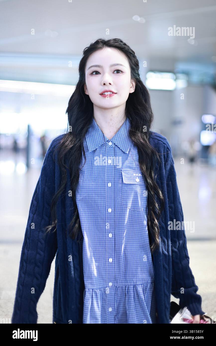 Chinese actress and singer Chen Zhuoxuan appears at the airport in ...