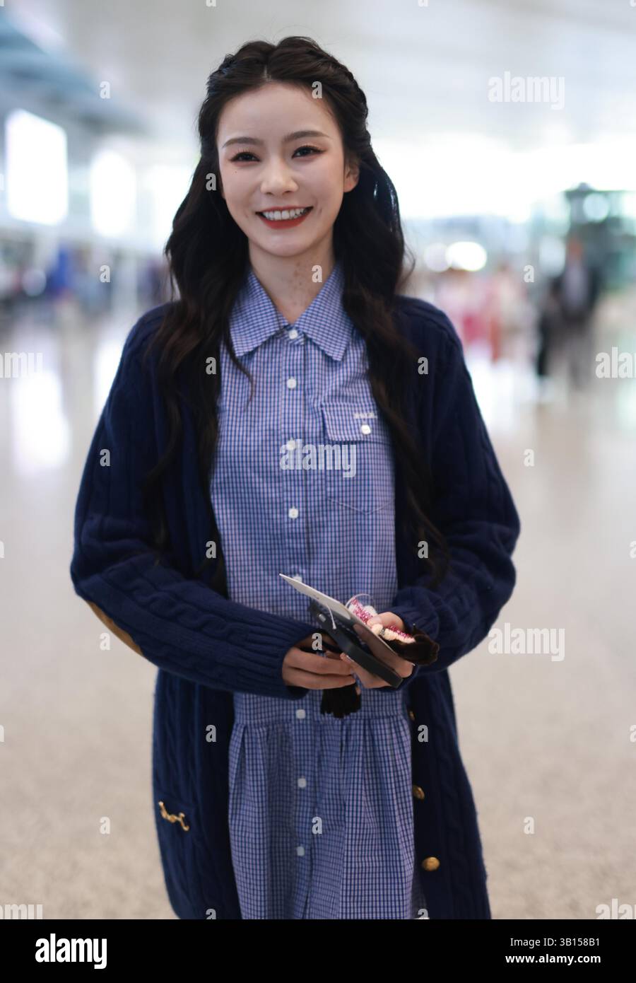 Chinese actress and singer Chen Zhuoxuan appears at the airport in ...