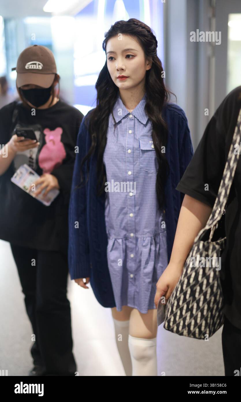 Chinese actress and singer Chen Zhuoxuan appears at the airport in ...