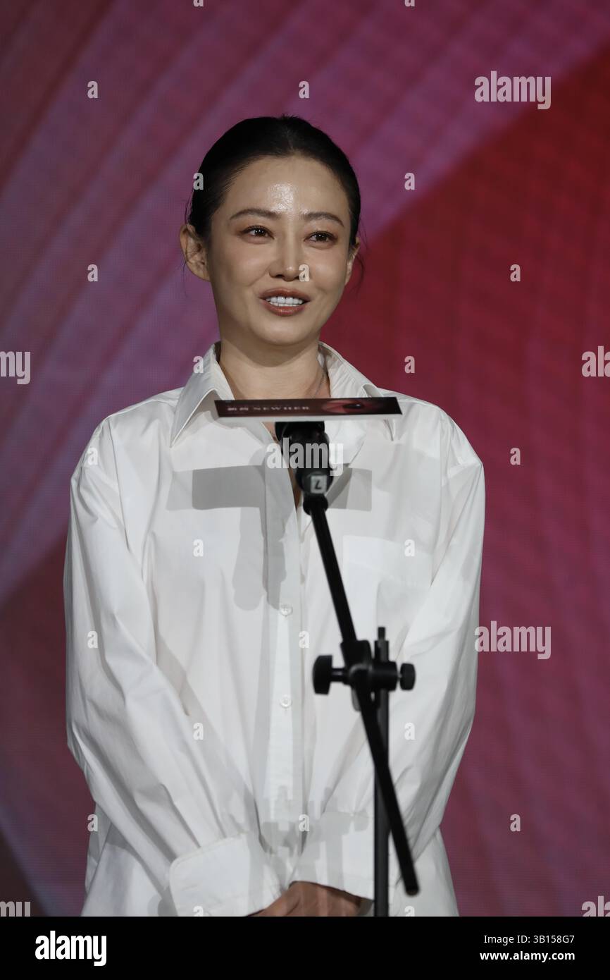 Chinese television and film actress Tan Zhuo attends an activity in ...