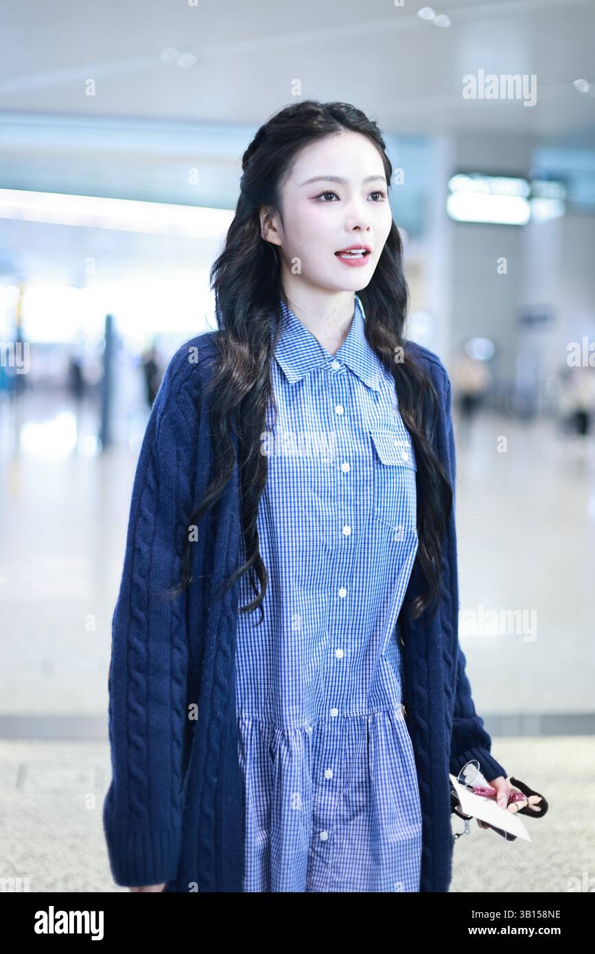 Chinese actress and singer Chen Zhuoxuan appears at the airport in ...